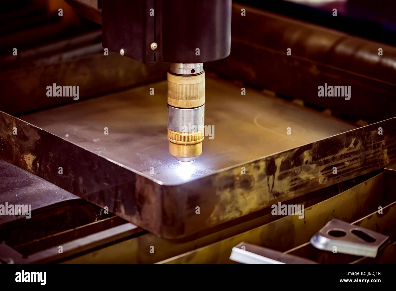 CNC Laser plasma cutting of metal, modern industrial technology.Small ...