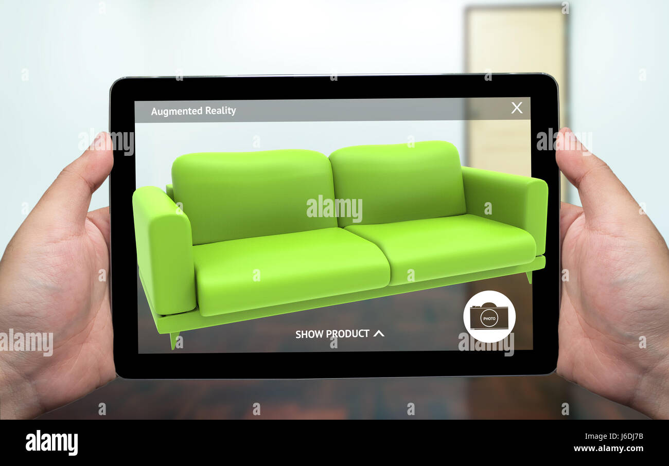 Augmented reality marketing technology concept. Hand holding tablet use ...