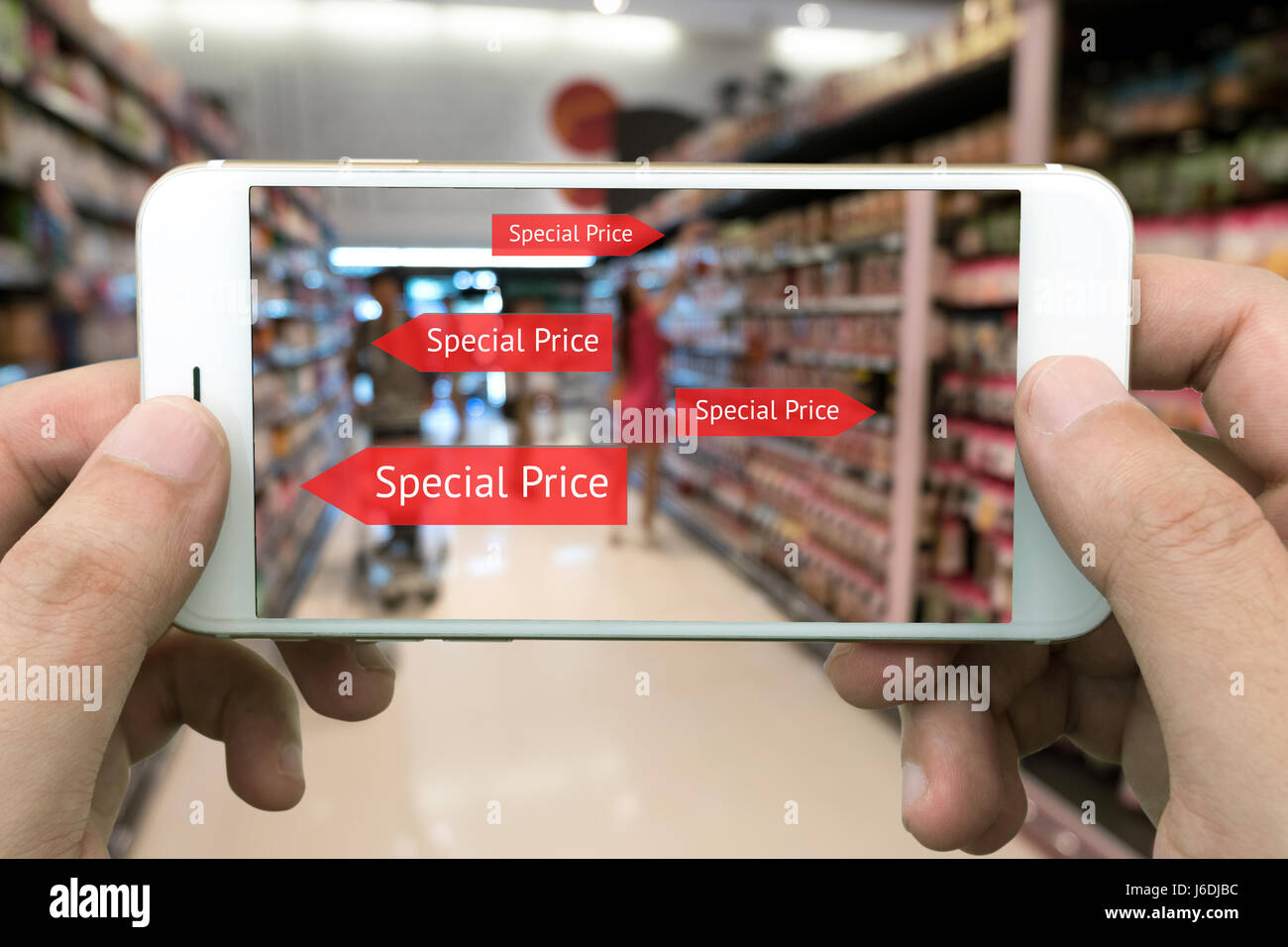 Augmented reality marketing concept. Hand holding smart phone use AR ...