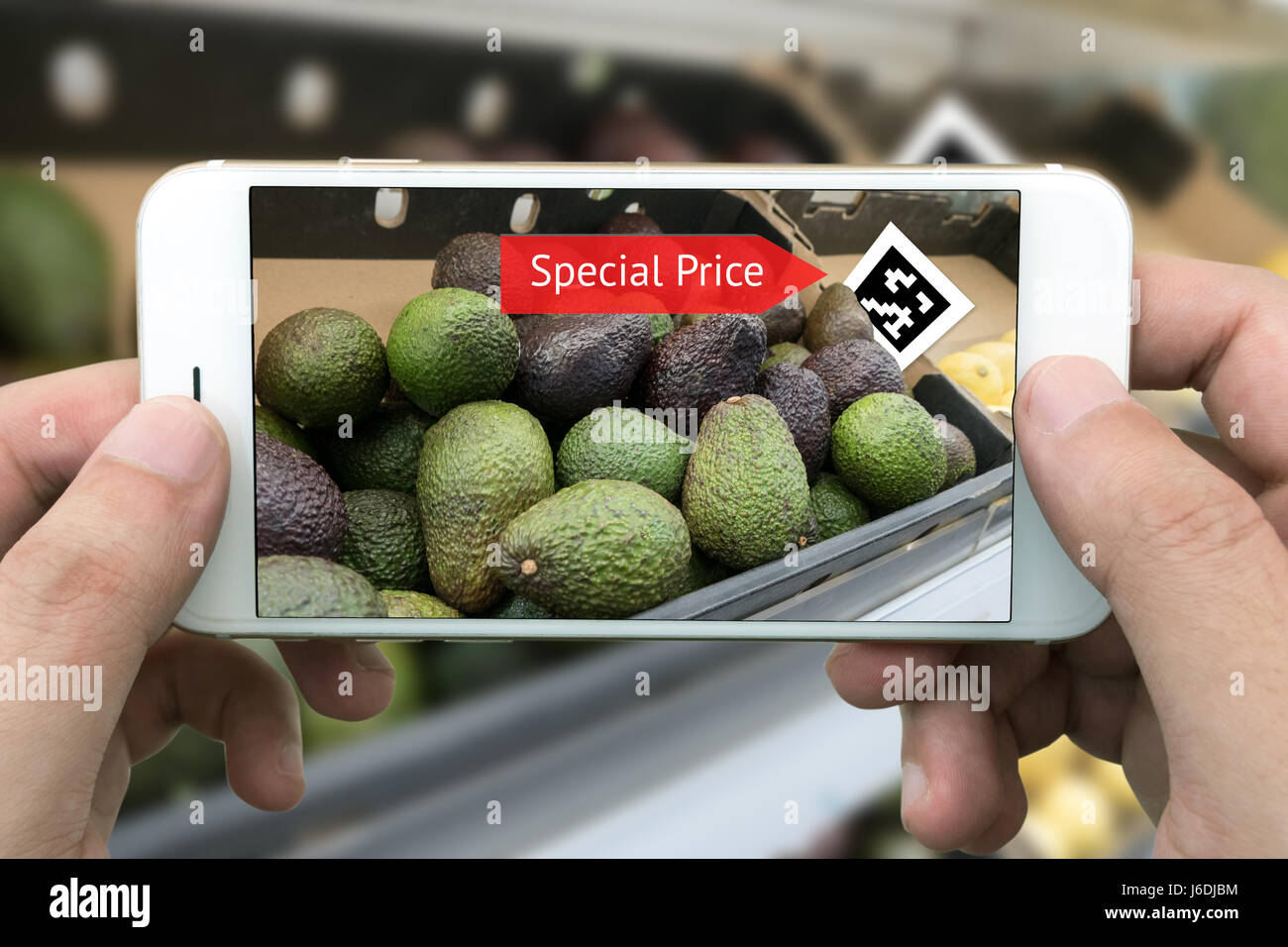 Augmented reality marketing concept. Hand holding smart phone use AR ...