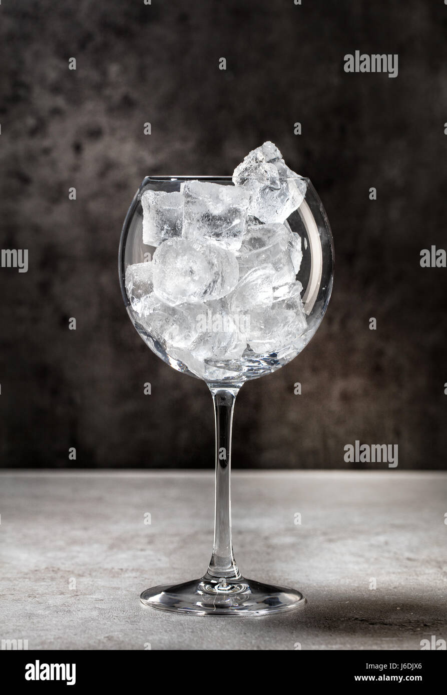 glass full of ice cubes, ready for making cocktail Stock Photo - Alamy