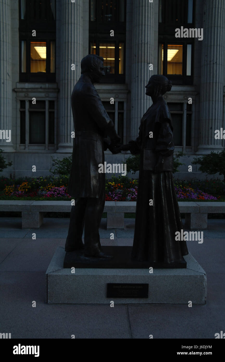 Dark evening portrait of Joseph and Emma Smith Statue,in front of LDS ...