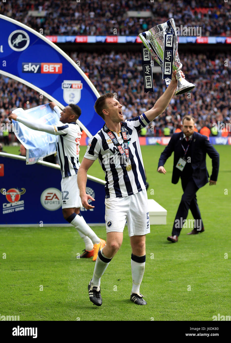 Millwall captain Tony Craig celebrate with the trophy after the Sky Bet ...