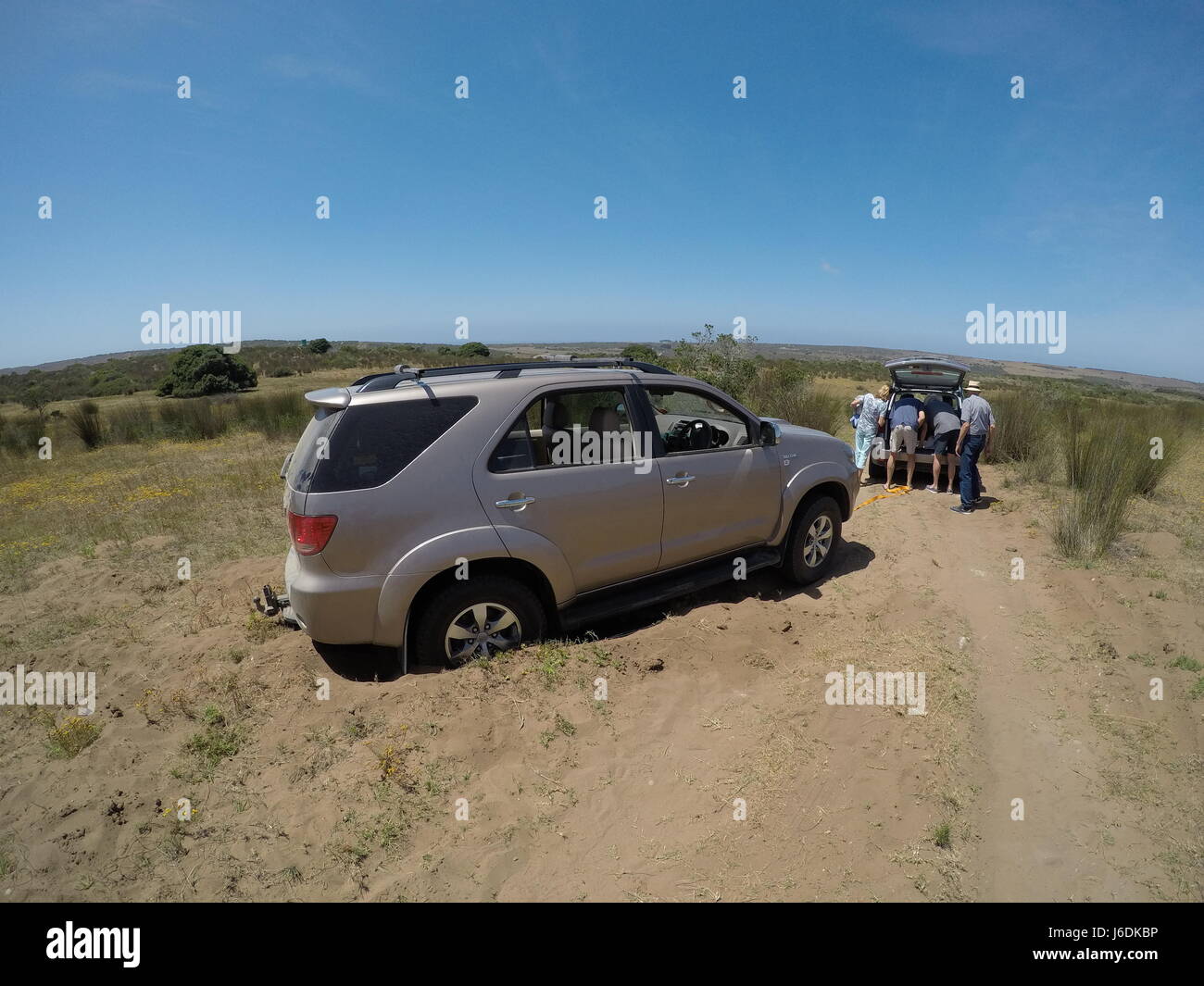 Car stuck in sand hi-res stock photography and images - Alamy