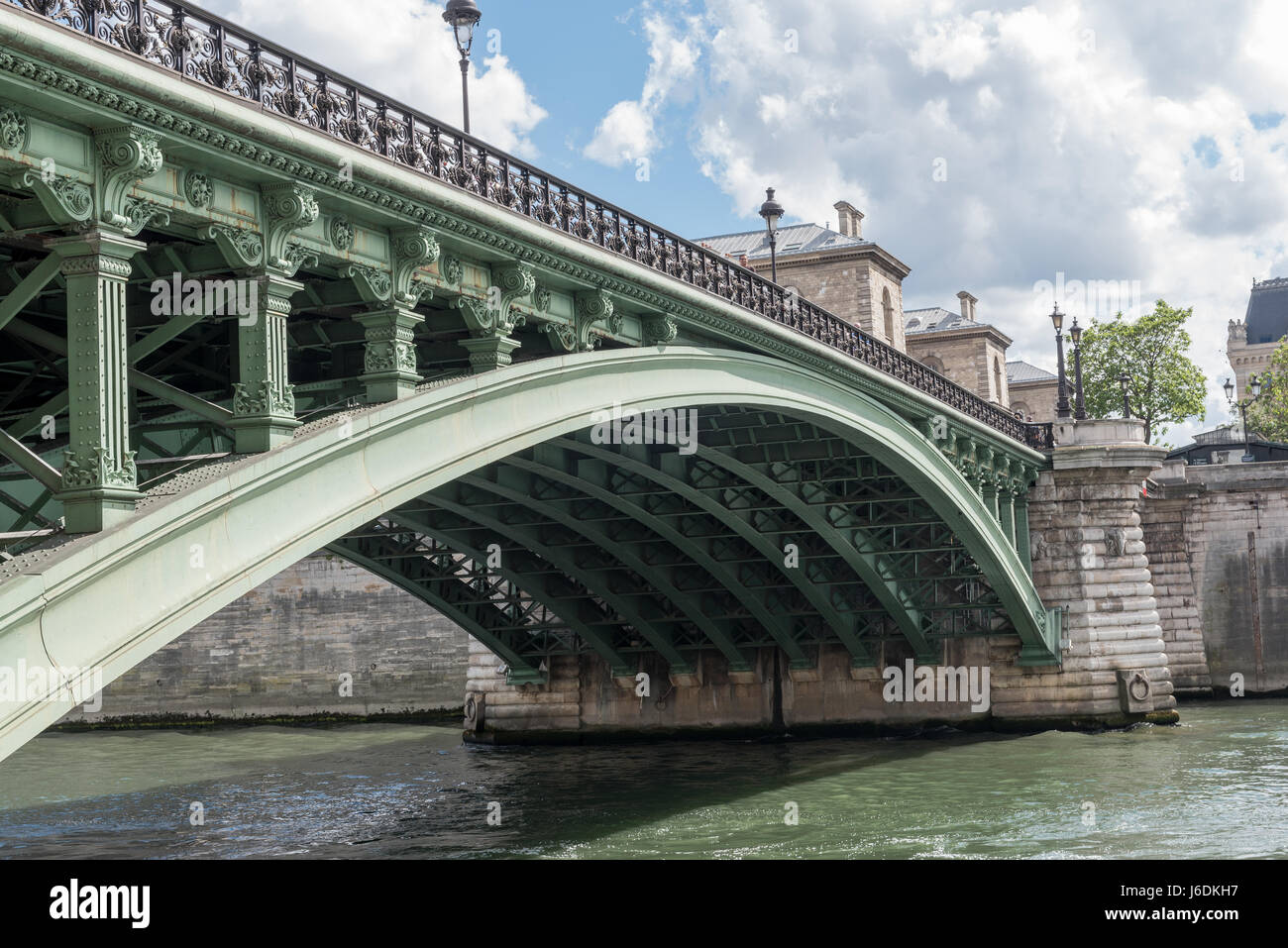 Notre-Dame Bridge in Paris France on a sunny day with blue cloudy sky ...