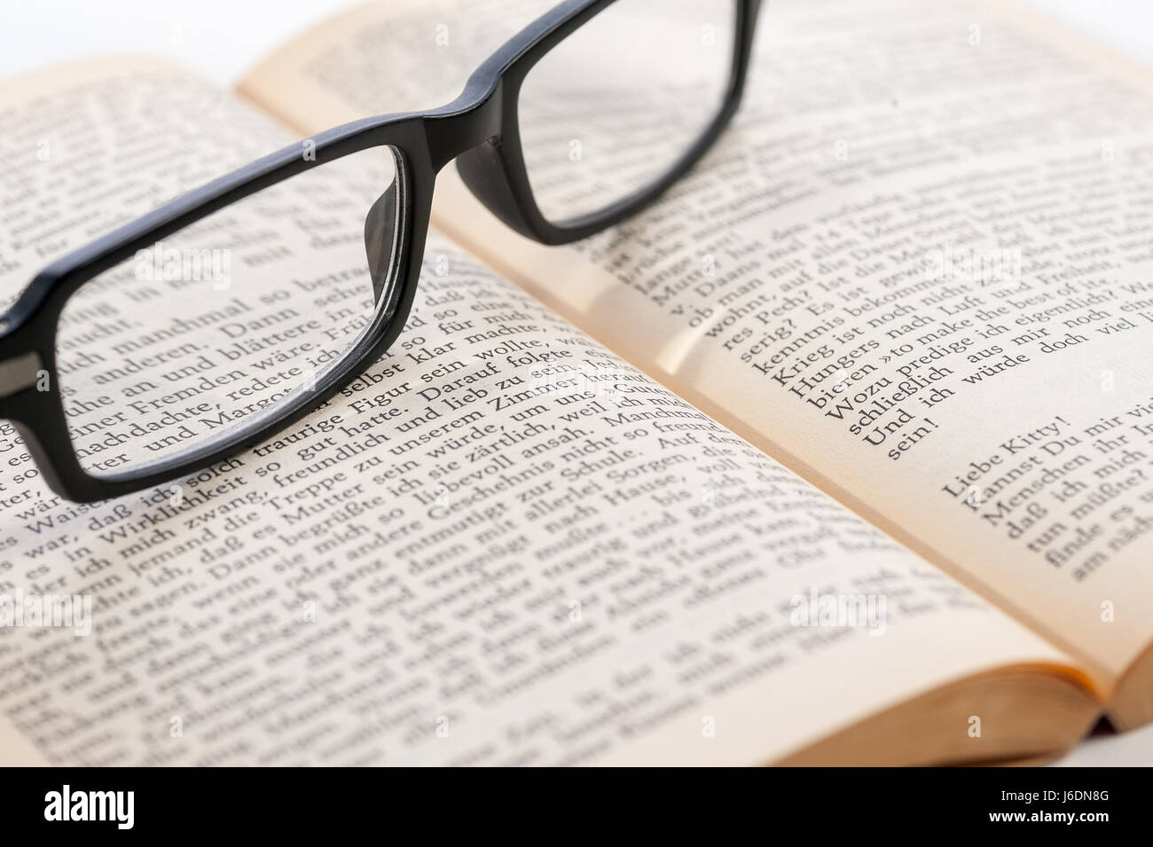 Glasses on book hi-res stock photography and images - Alamy
