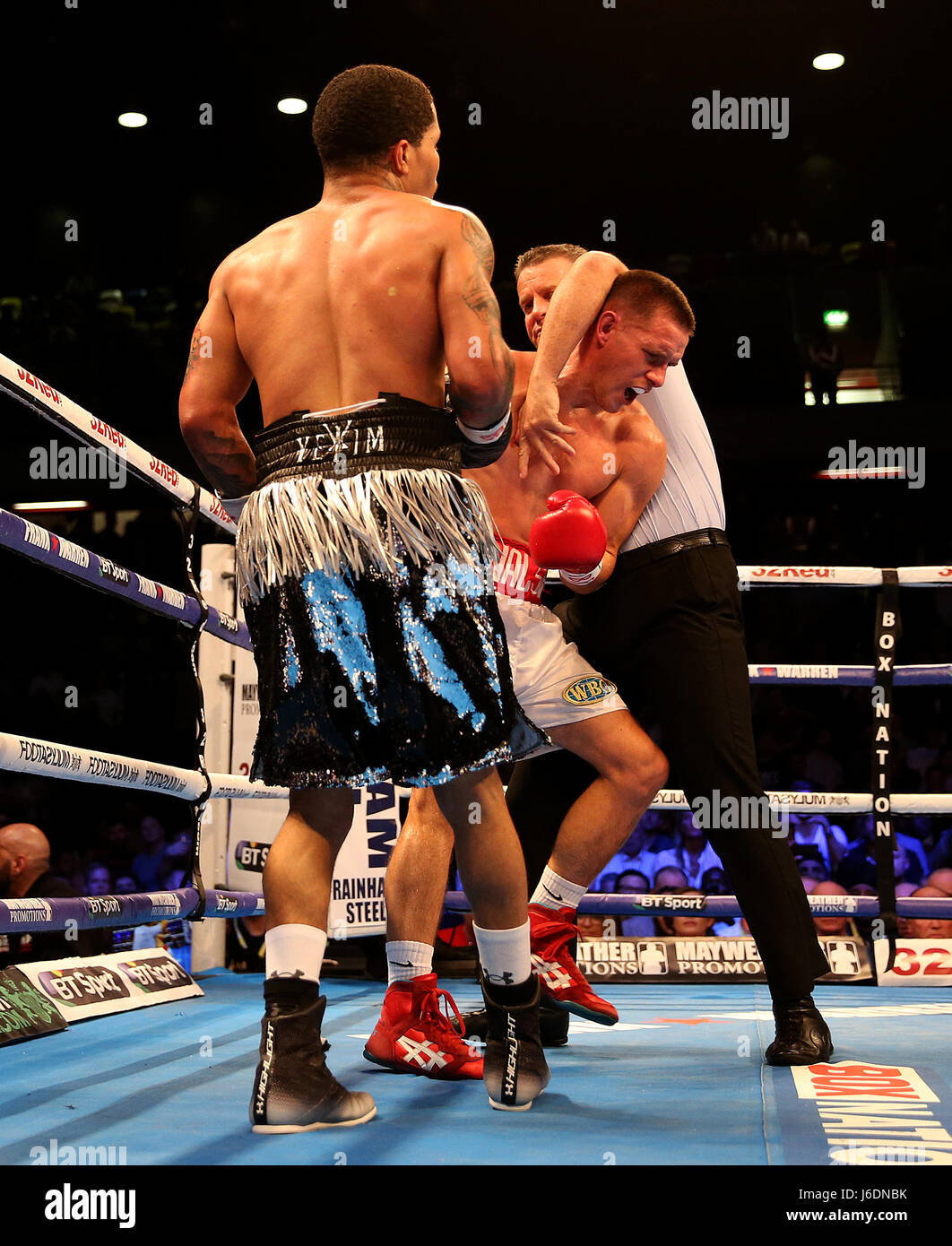 Liam Walsh reacts as the referee jumps in to stop the fight against ...