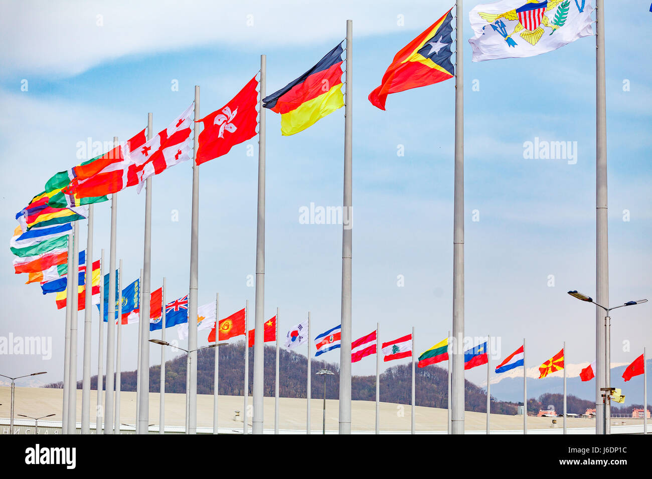 Flags of countries. different countries on the flagpole Stock Photo - Alamy