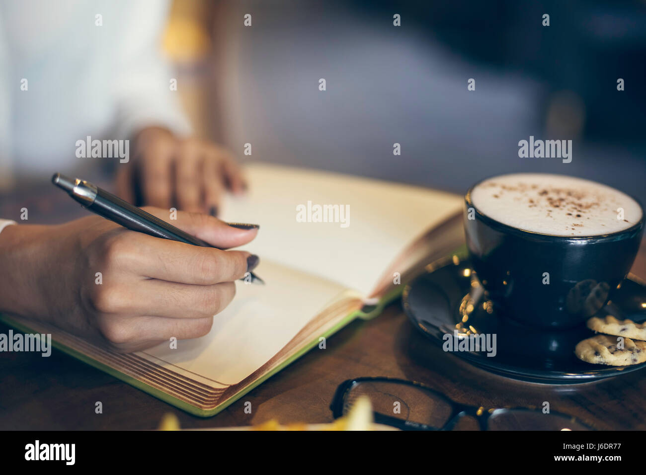 Adult notebook writing hi-res stock photography and images - Alamy
