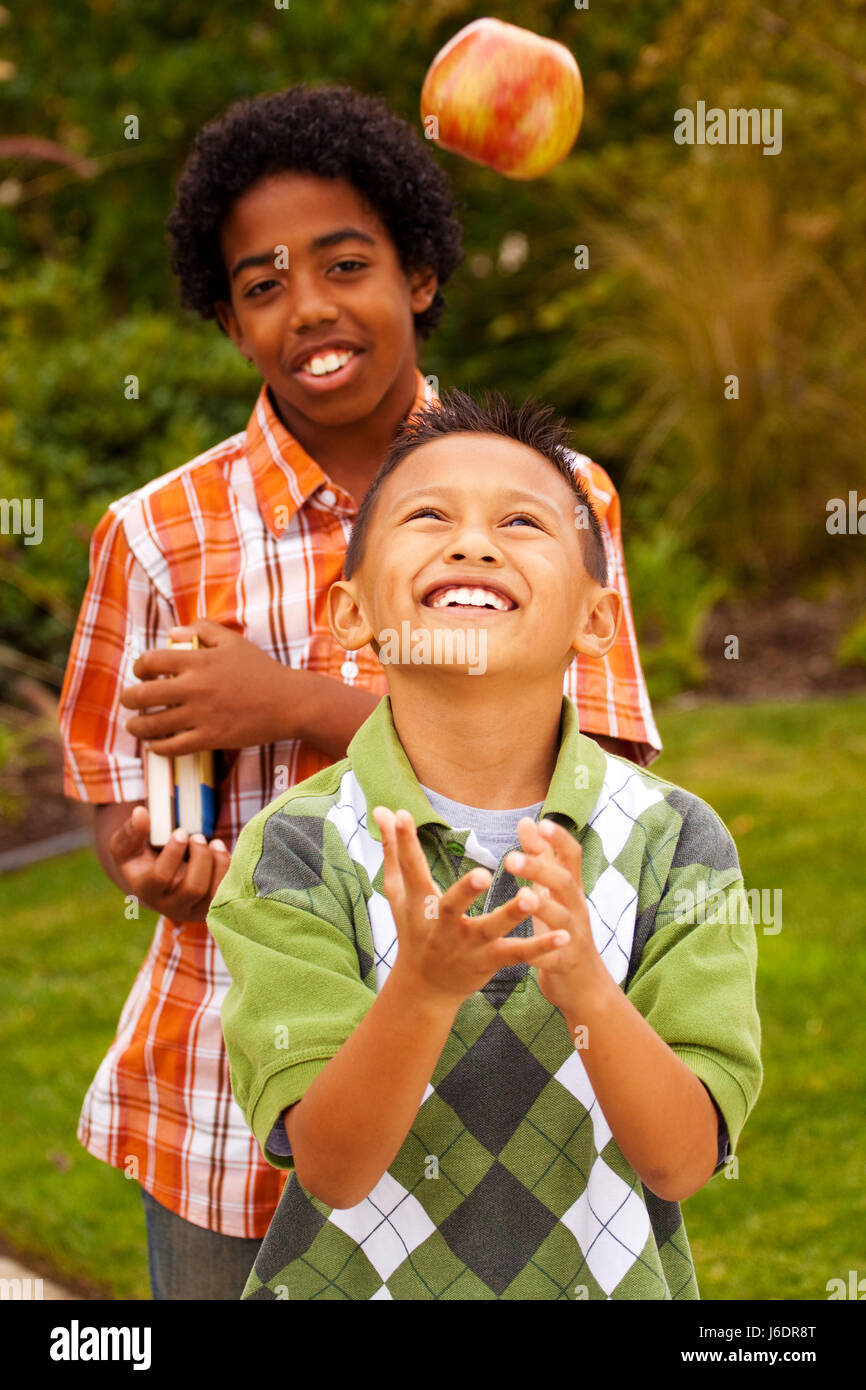 Happy young kids smiling and laughing Stock Photo - Alamy
