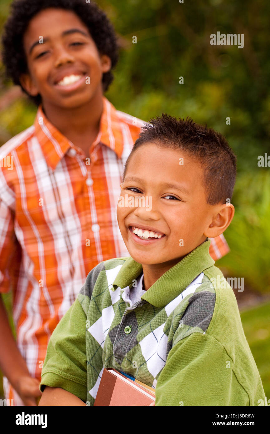 Happy young kids smiling and laughing Stock Photo - Alamy
