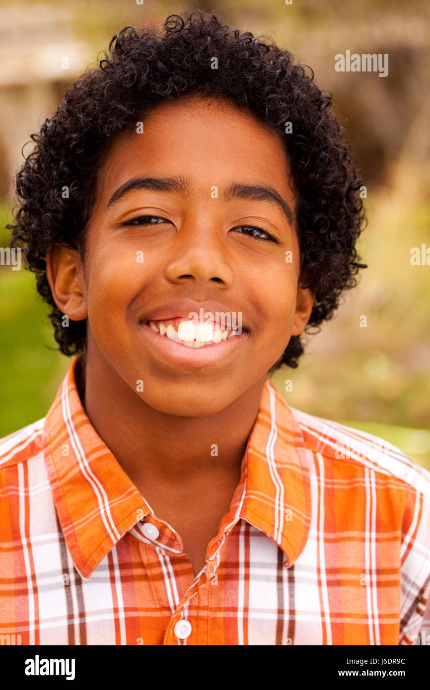 Happy young kid smiling and laughing Stock Photo - Alamy