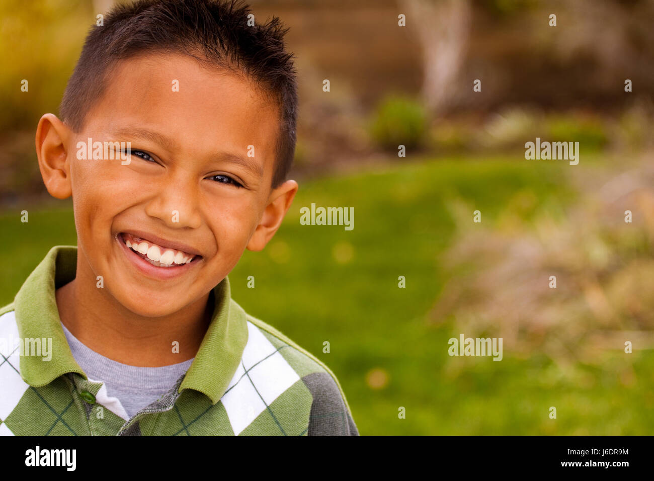 Happy young Asian kid smiling and laughing Stock Photo - Alamy
