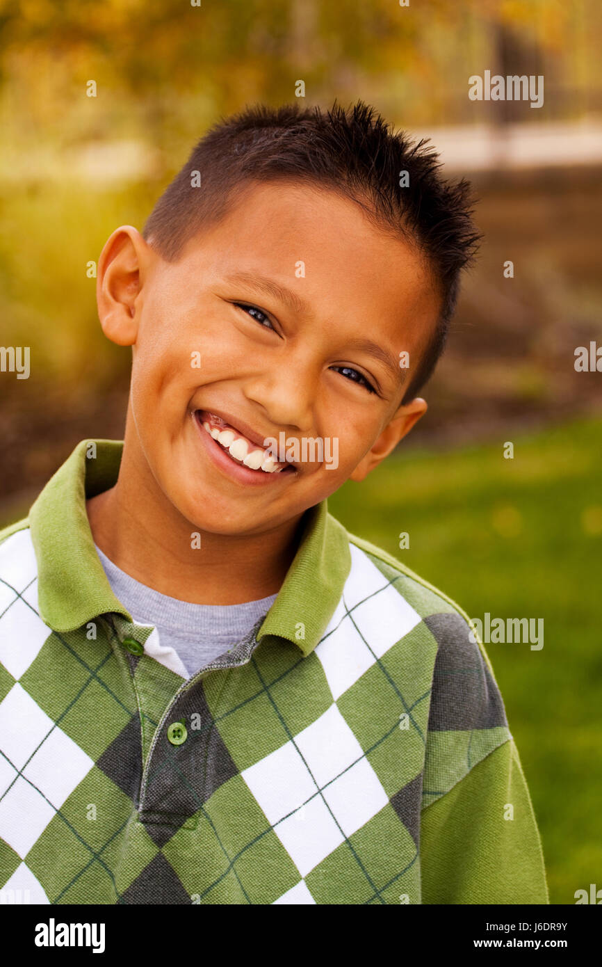 Happy young Asian kid smiling and laughing Stock Photo - Alamy