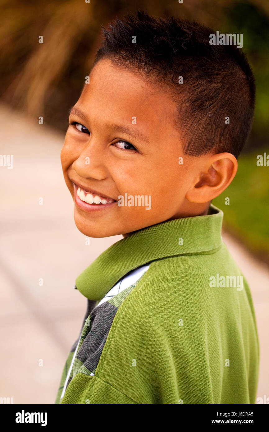 Happy young Asian kid smiling and laughing Stock Photo - Alamy