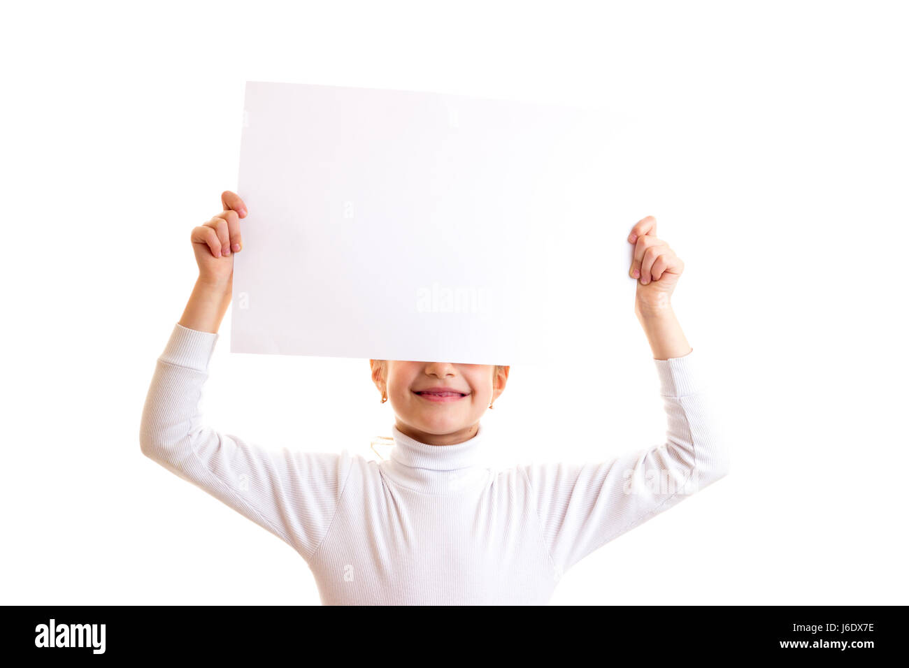 Little girl holding white banner Stock Photo - Alamy