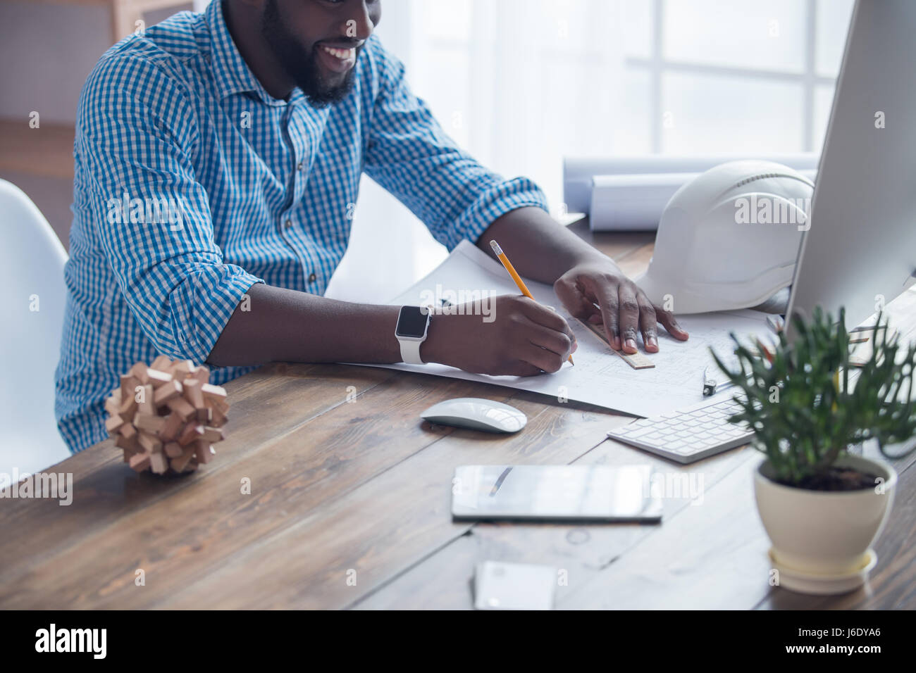 Young african man working in the office business Stock Photo - Alamy