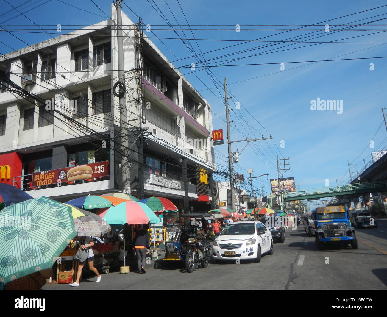 This title refers to a specific location along the EDSA highway, near ...