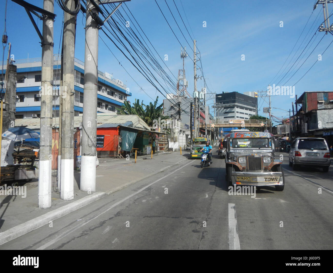 This image captures the scene from the EDSA highway in Balintawak ...