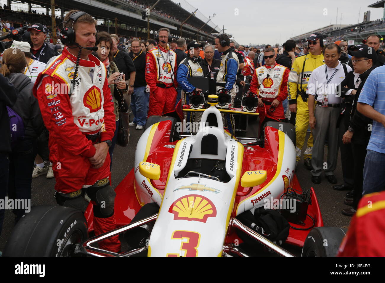 Members of Helio Castroneves' crew line up before the 2013 Indianapolis ...