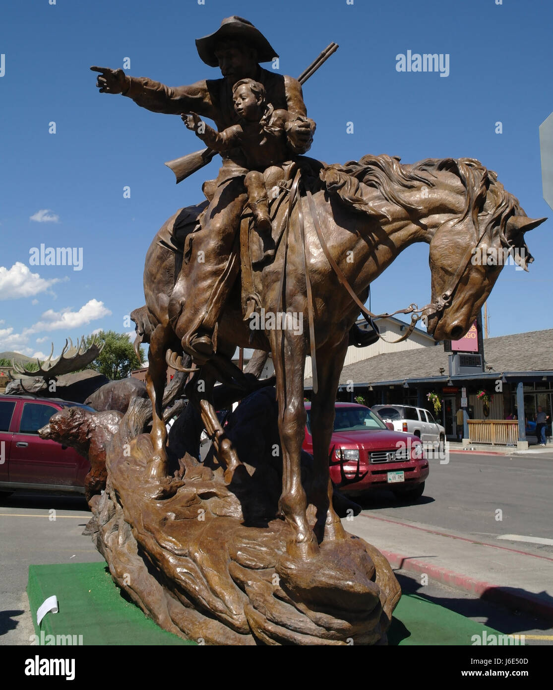 Blue sky portrait Vic Payne's Old West bronze sculpture 'Memories ...