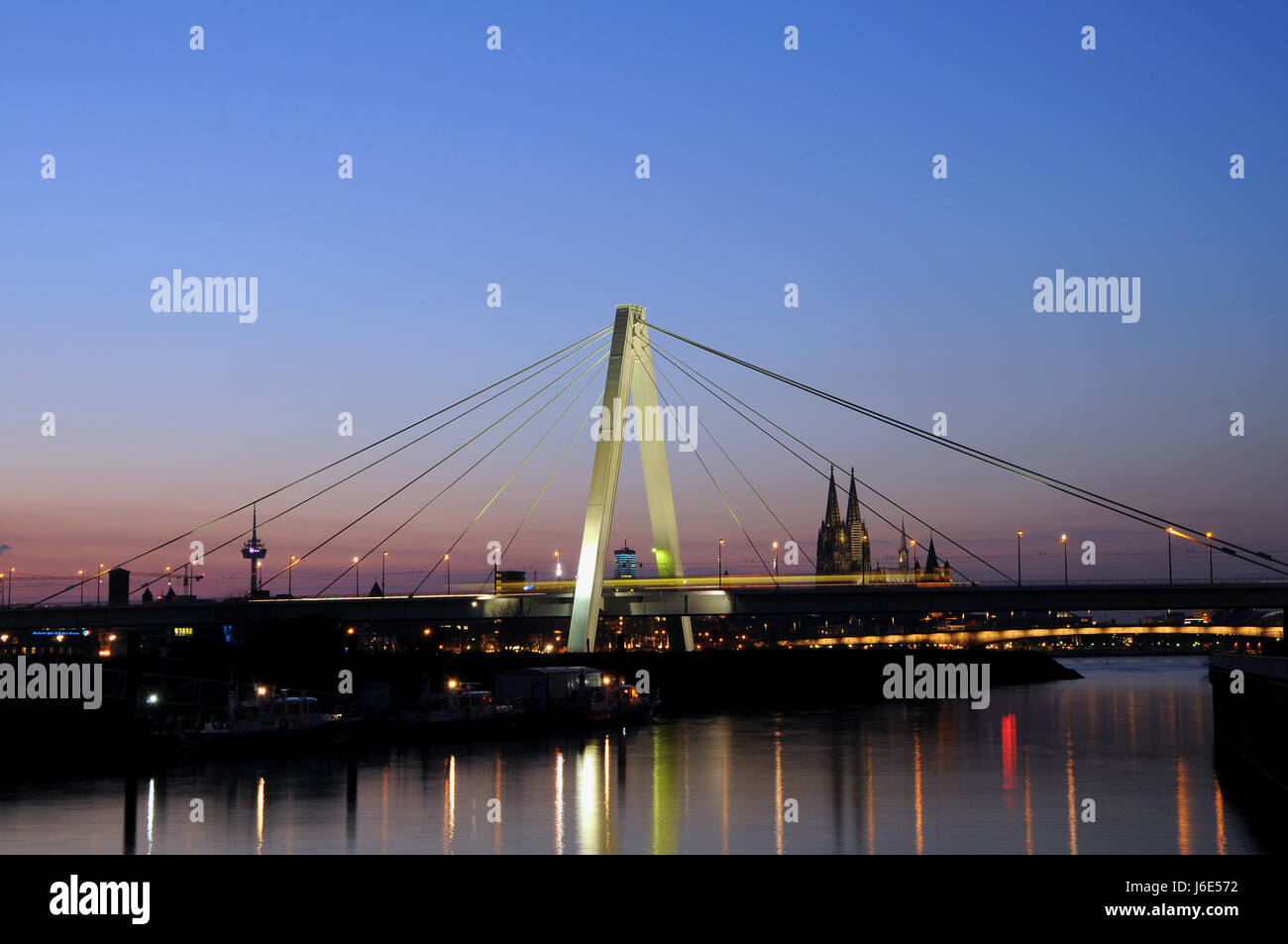 cologne bridge night nighttime night photograph navigation thunderstorm ...