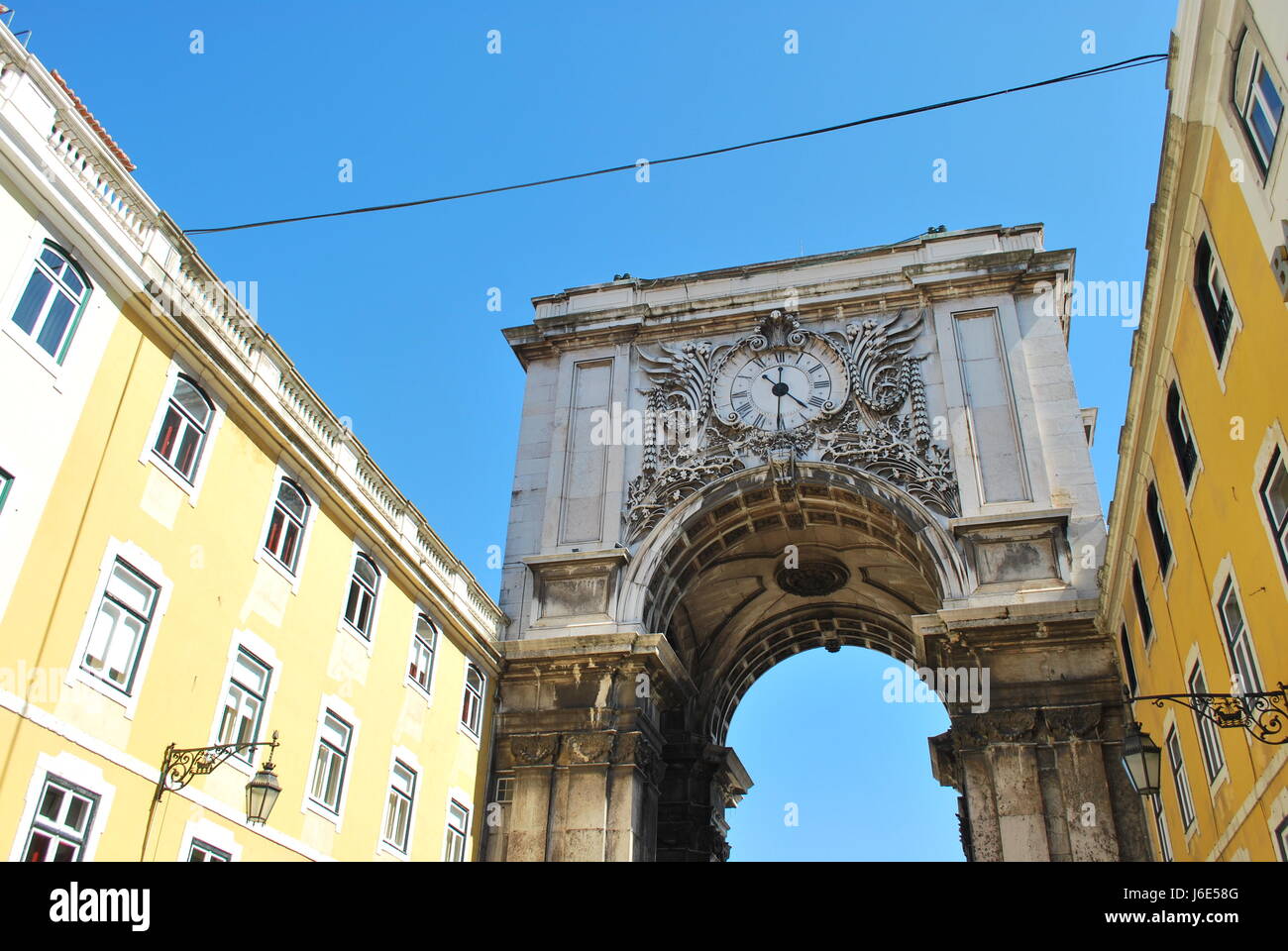 city town monument arch clock square lisbon commerce landmark tower ...