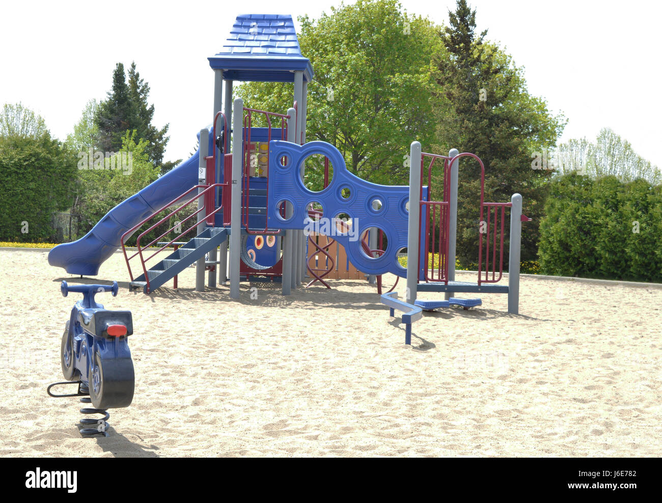 An empty playground in broad daylight Stock Photo - Alamy