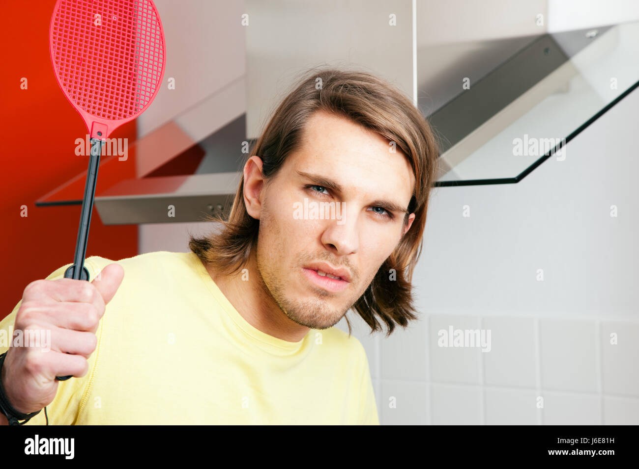 man chasing insects Stock Photo - Alamy