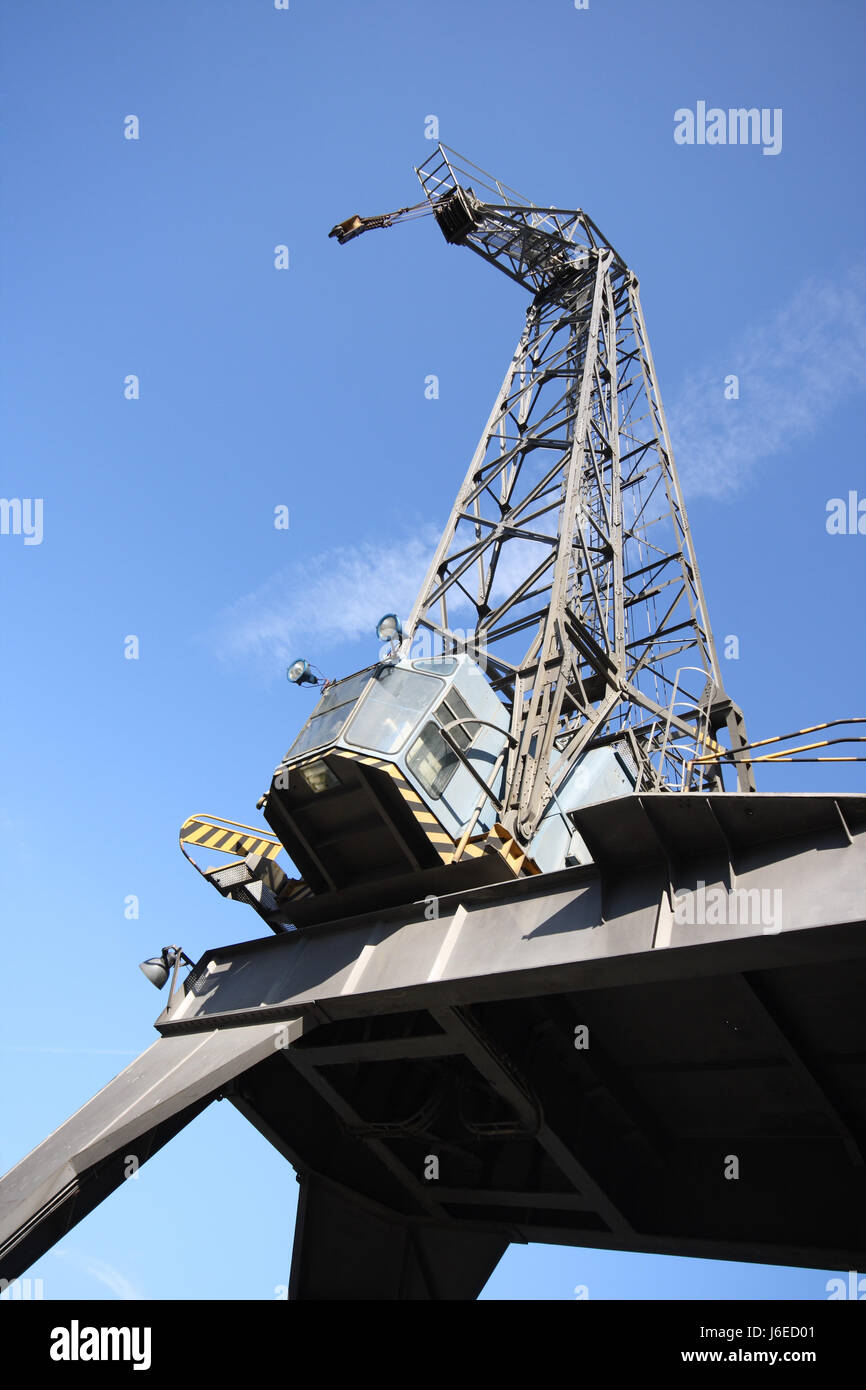 engineering crane worms eye transport steel lamps raise firmament sky ...