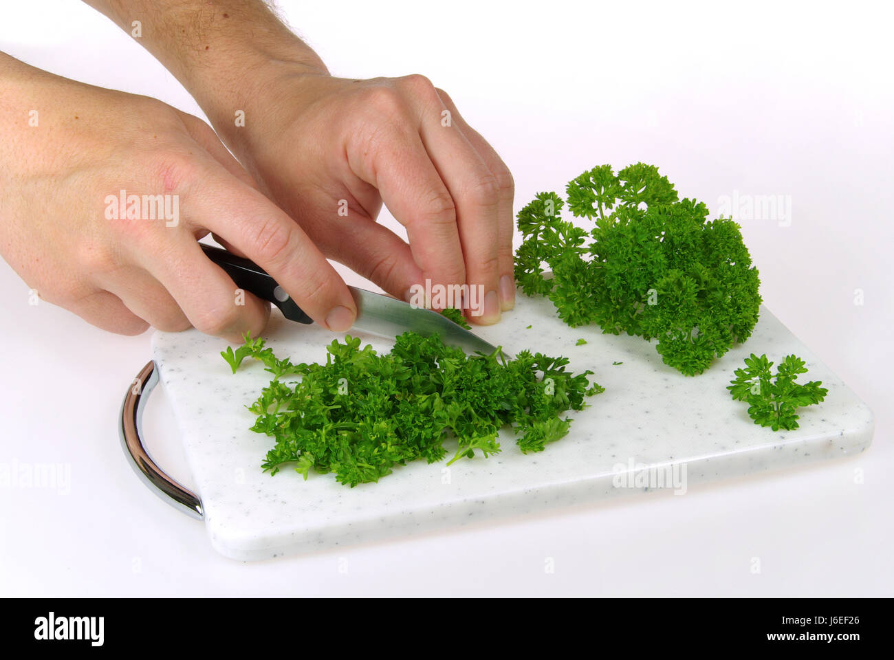 parsley cut - parsley cutting 01 Stock Photo - Alamy