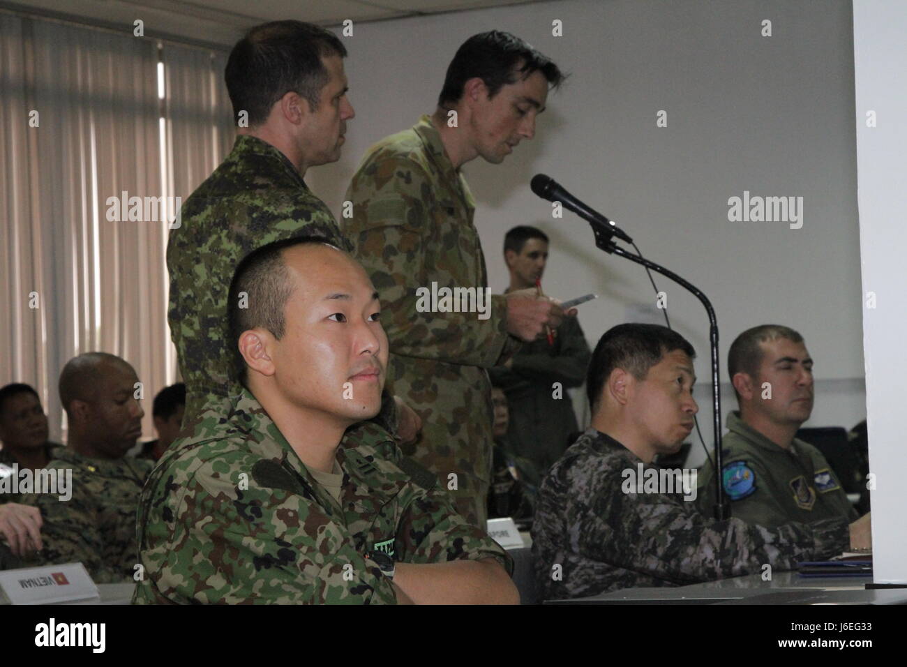 An Australian liaison officer assigned to Joint Task Force 505 briefs ...