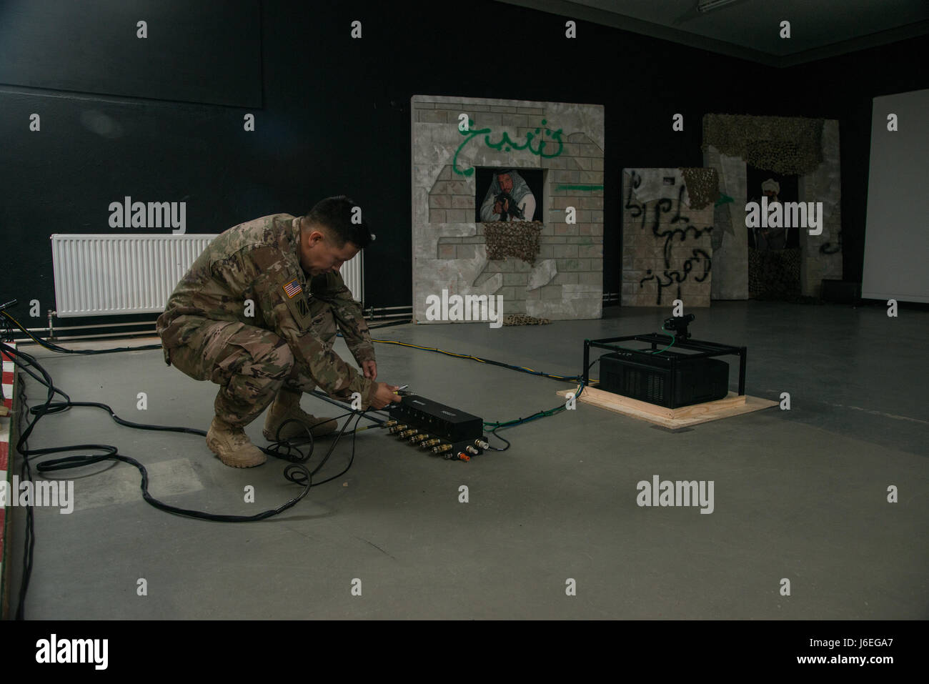 U.S. Soldiers train using the Engagement Skills Trainer II, EST II, at ...