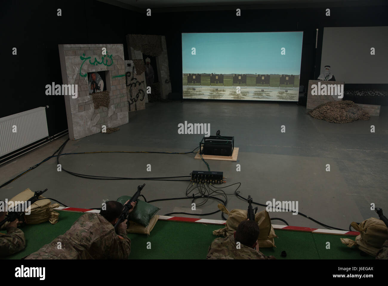 U.S. Soldiers train using the Engagement Skills Trainer II, EST II, at ...