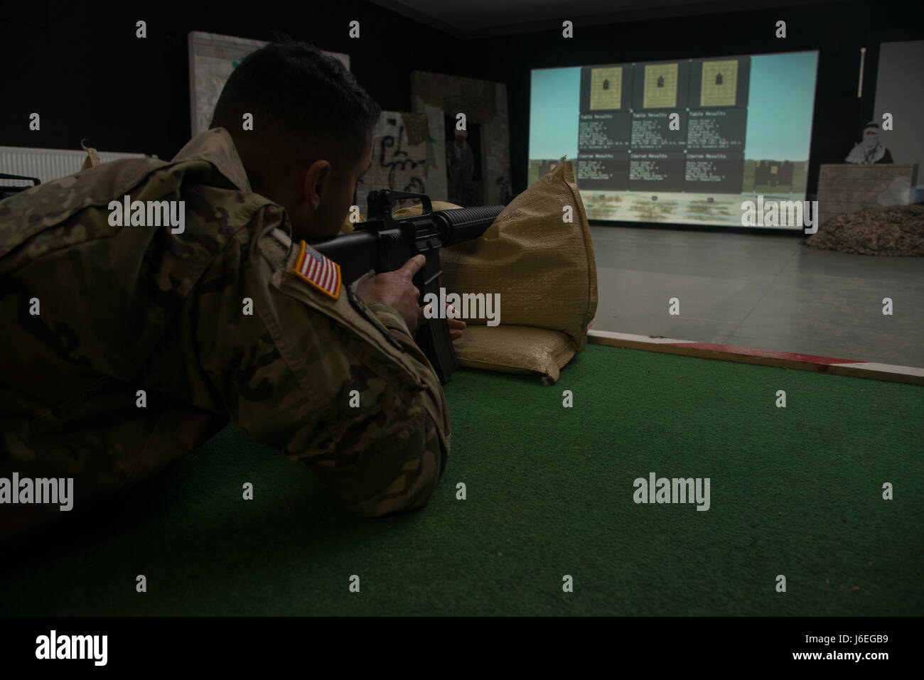 U.S. Soldiers train using the Engagement Skills Trainer II, EST II, at ...