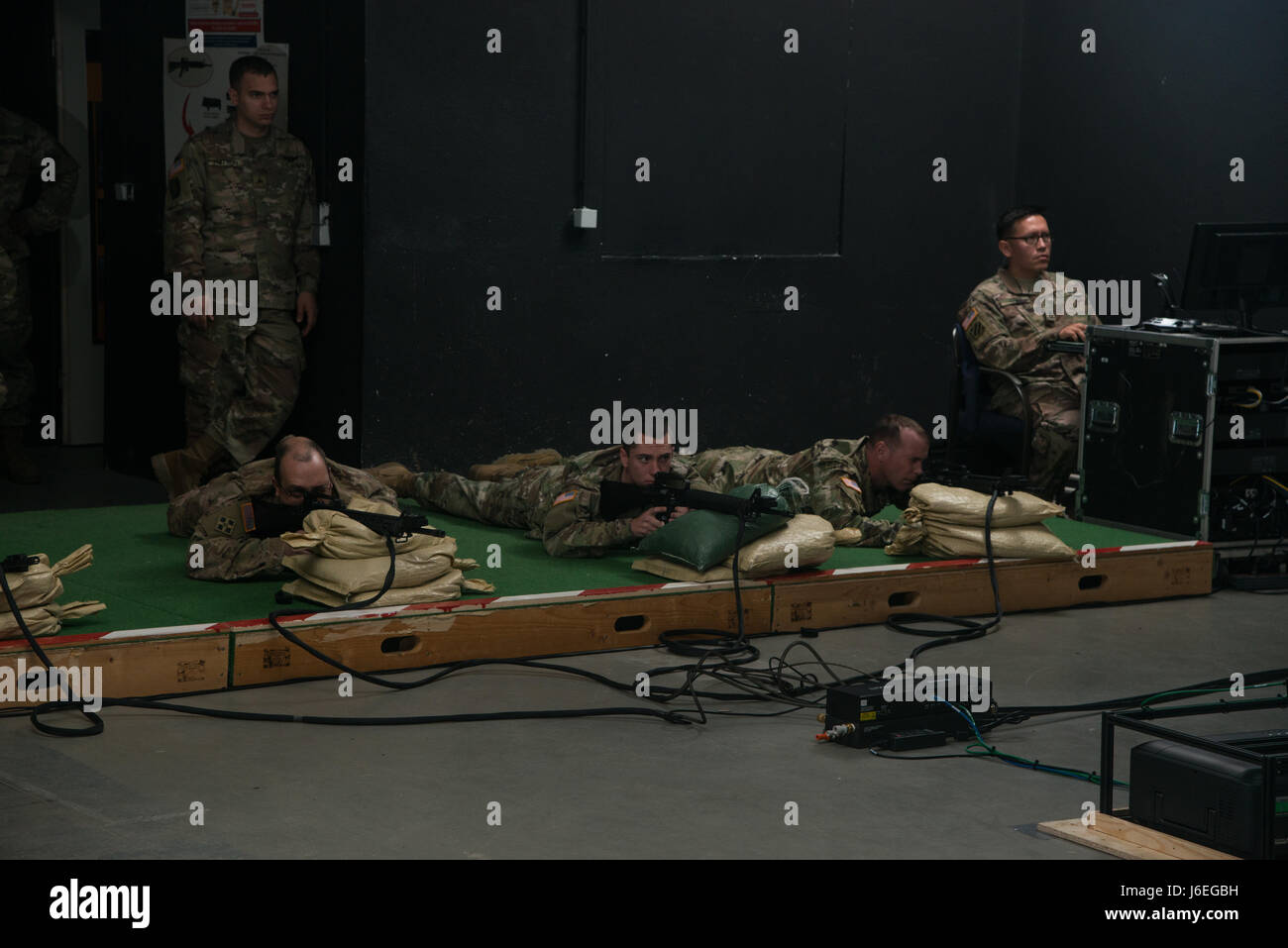 U.S. Soldiers train using the Engagement Skills Trainer II, EST II, at ...