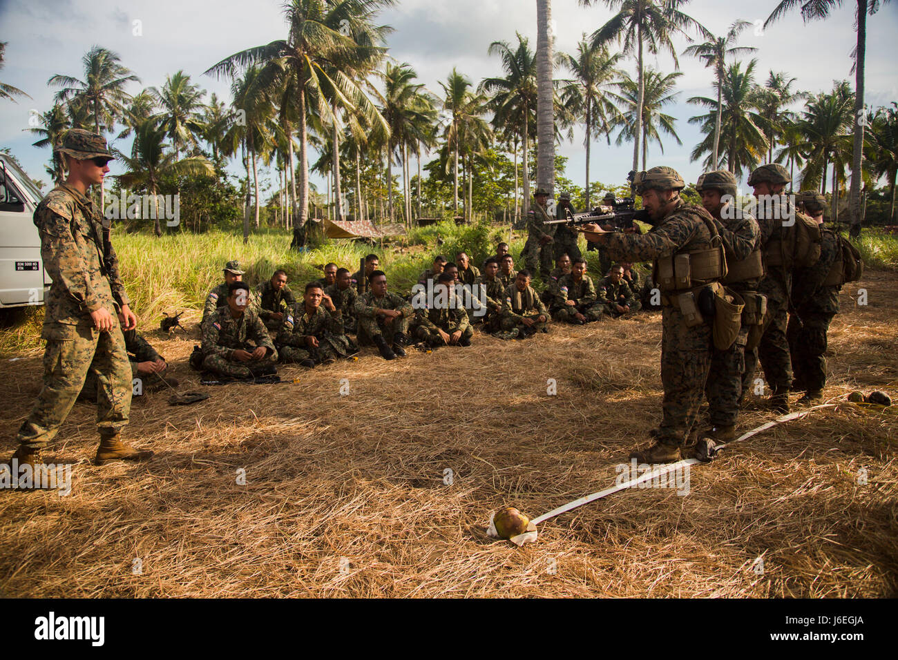 U.S. Marines with 2nd Battalion, 4th Marine Regiment, instruct ...