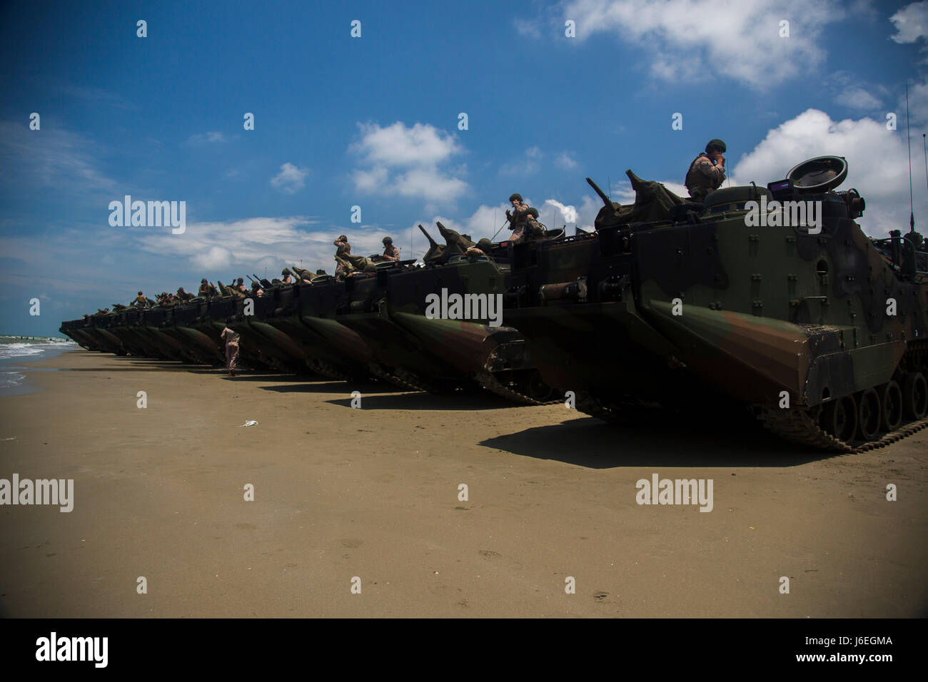 U.S. Marines, Sailors, and Malaysian soldiers conduct a joint simulated ...