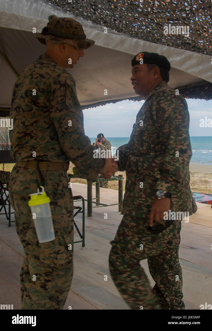 U.S. Marine Corps Maj. Ben Reid, left, executive officer of 2nd ...