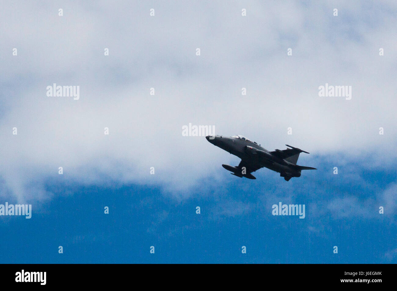 A Malaysian Hawker flies over Tanduo Beach beginning a joint simulated ...