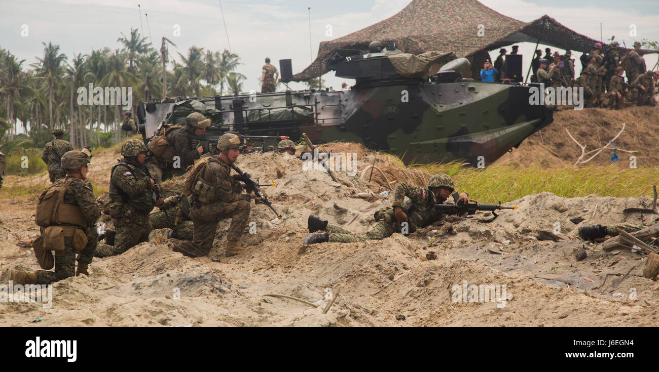 U.S. Marines, Sailors, and Malaysian soldiers conduct a joint simulated ...