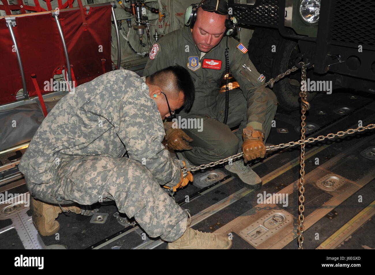 Army Spc. Bach Dong, a mechanic, both in the 890th Engineering ...