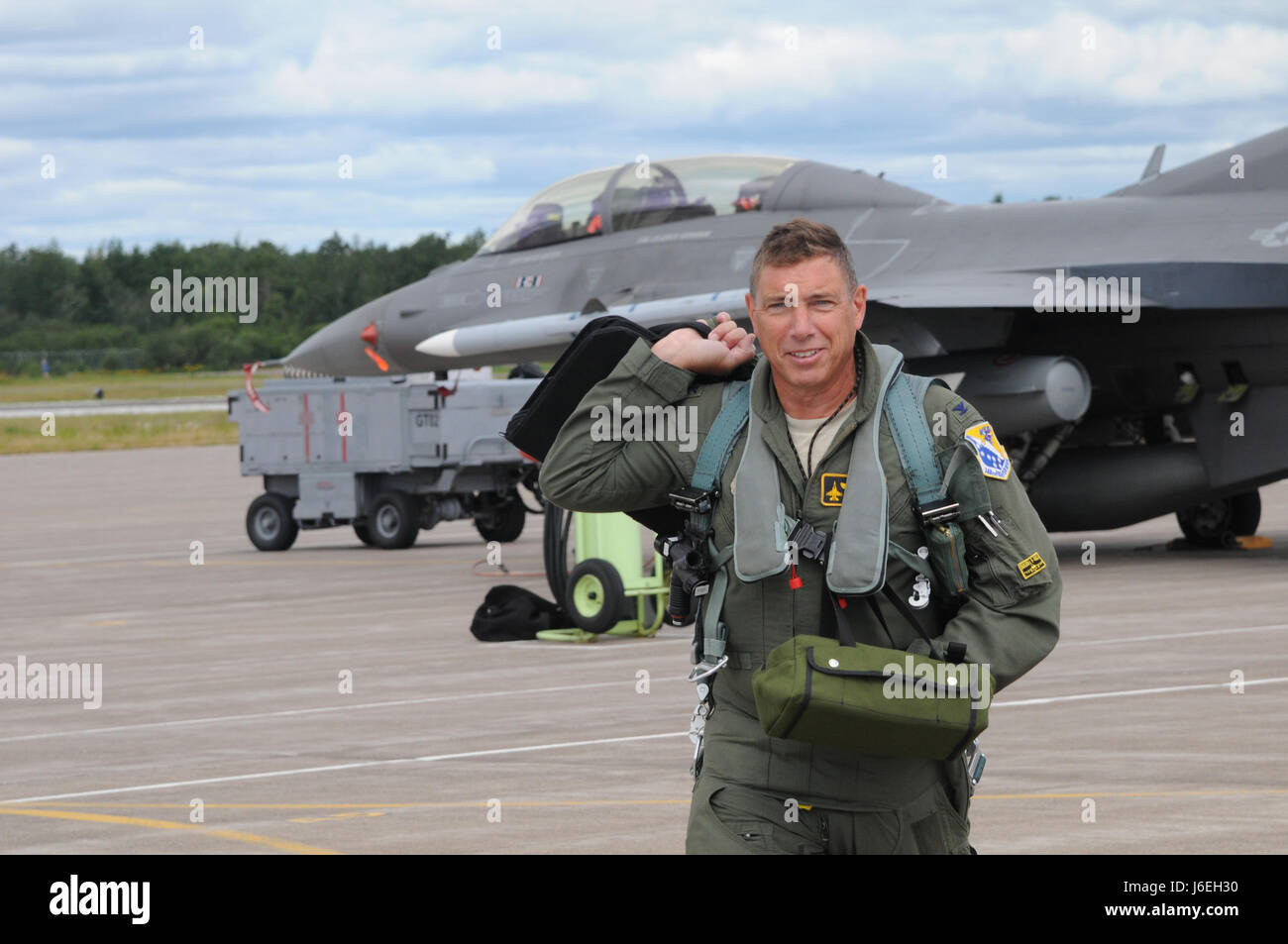 Brig. Gen. Frank H. Stokes walks across the ramp at the 148th Fighter ...