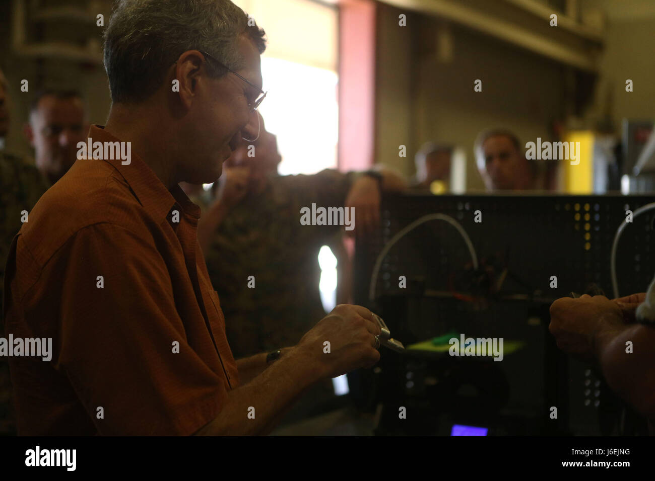 The Honorable Alan F. Esteves, left, Principal Deputy Under Secretary ...