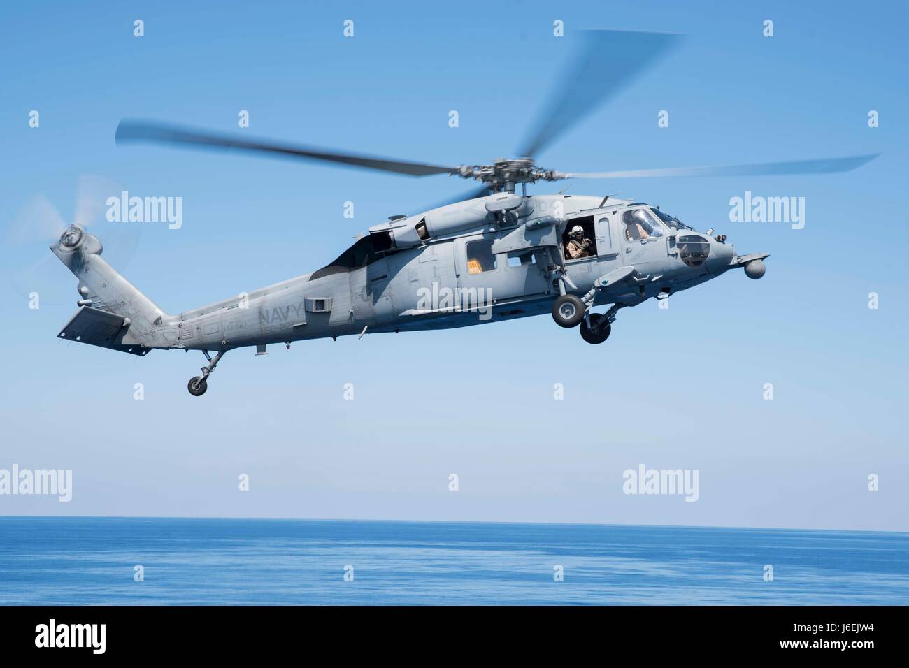 160817-N-LG762-060 MEDITERRANEAN SEA (Aug. 17, 2016) An MH-60S Sea Hawk helicopter prepares to ...