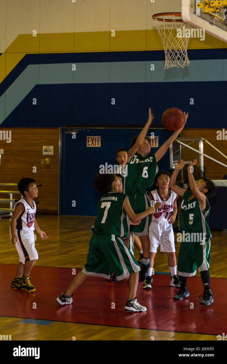 Japanese athletes from Otake and Iwakuni City play basketball during a ...