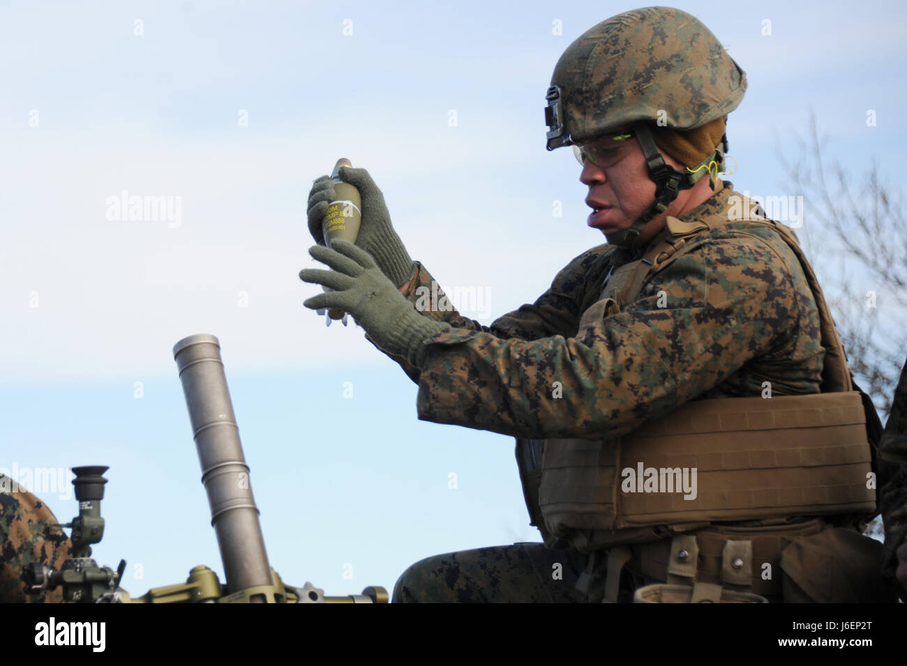 A mortar unit with the U.S. Marines Fox Company, 2nd Battalion, 24th ...