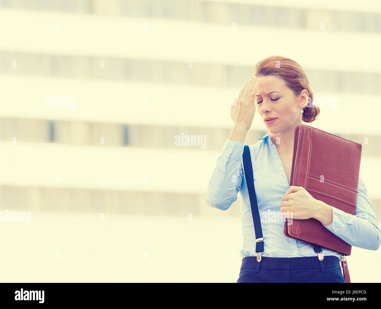 Portrait stressed worried unhappy young woman corporate employee having ...