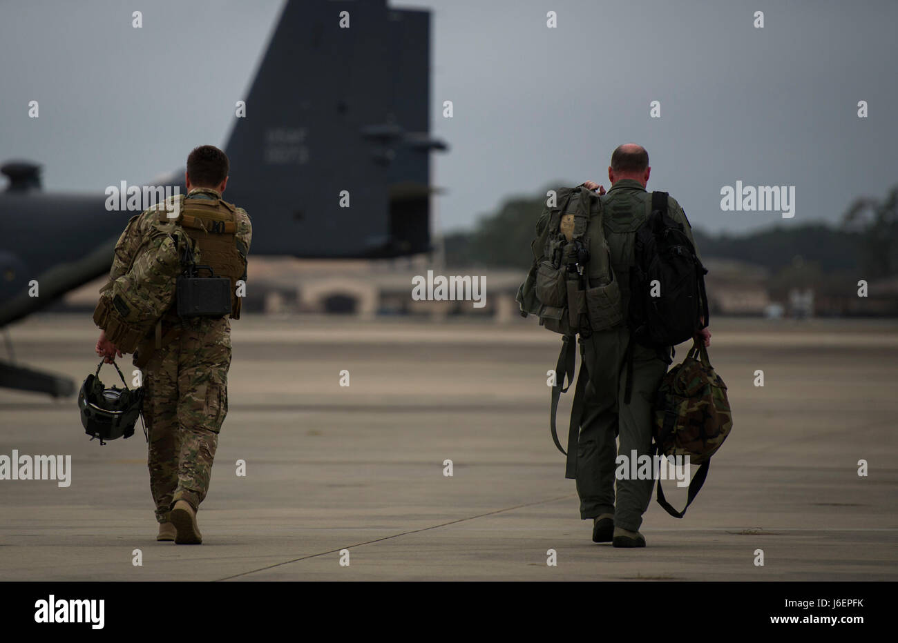 Maj. Nathan Eaton, left, a pilot with the 8th Special Operations ...