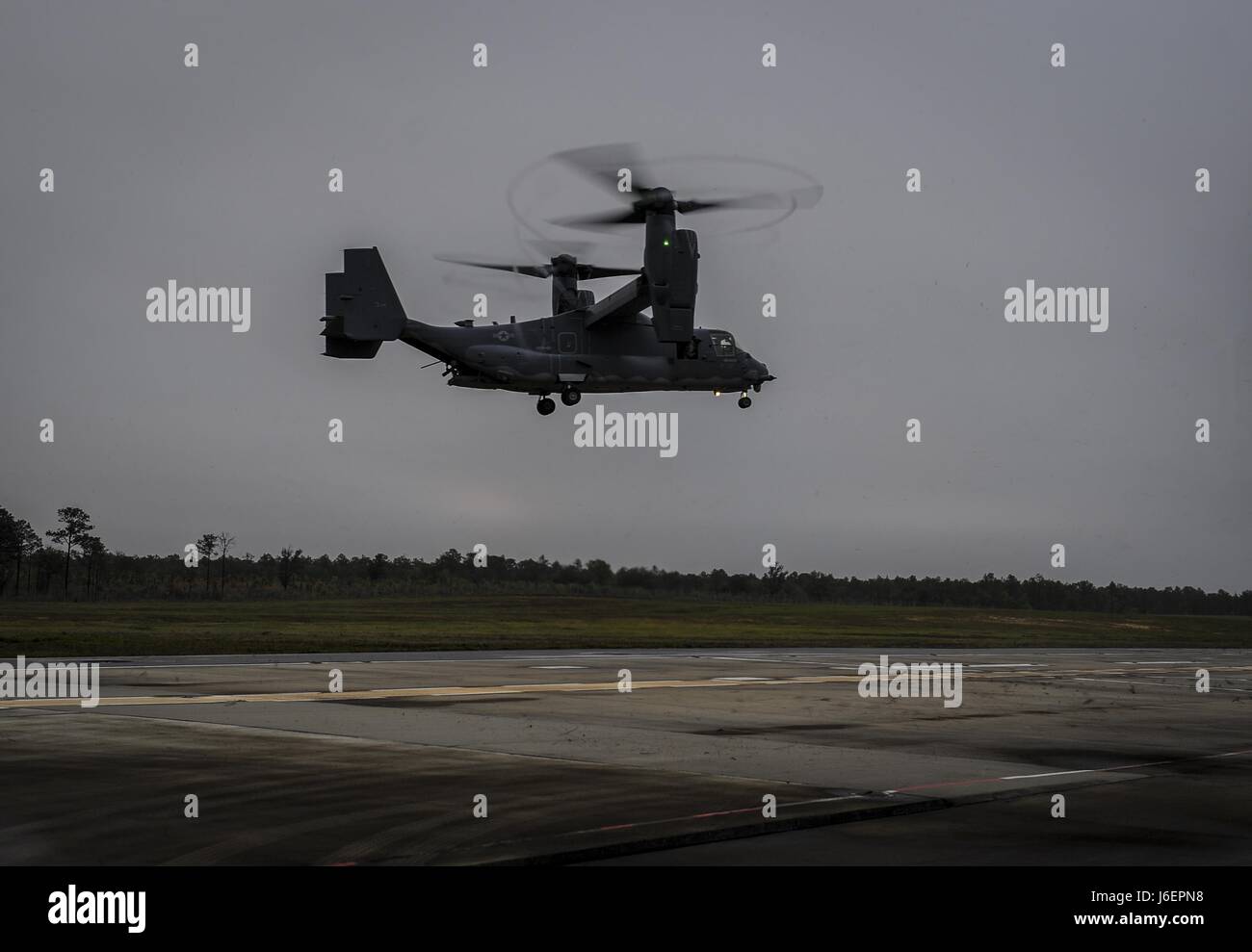 A CV-22 Osprey landed on the Landing Helicopter Deck at Duke Field, for ...